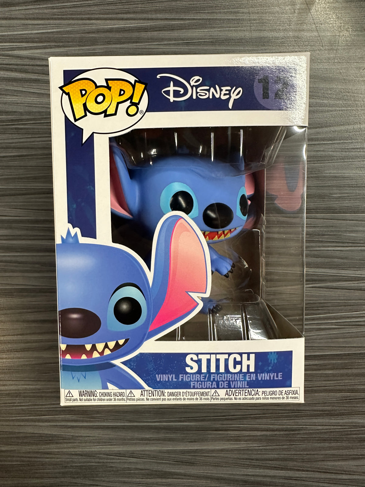 Funko POP! Disney: Stitch #12 — The Pop Plug